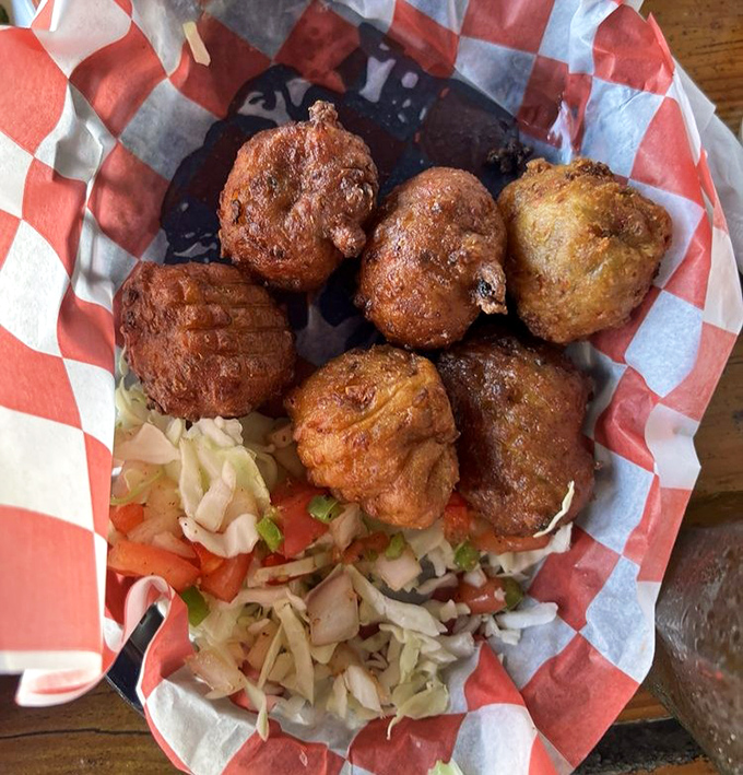 These conch fritters aren't just fried dough balls&mdash;they're little golden orbs of Keys history, served with a side of slaw and zero pretension.