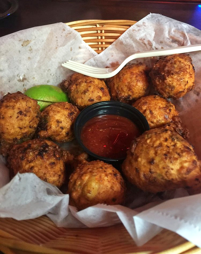 Conch fritters that would make Jimmy Buffett write another verse. Golden-brown spheres of island flavor served with zippy dipping sauce.