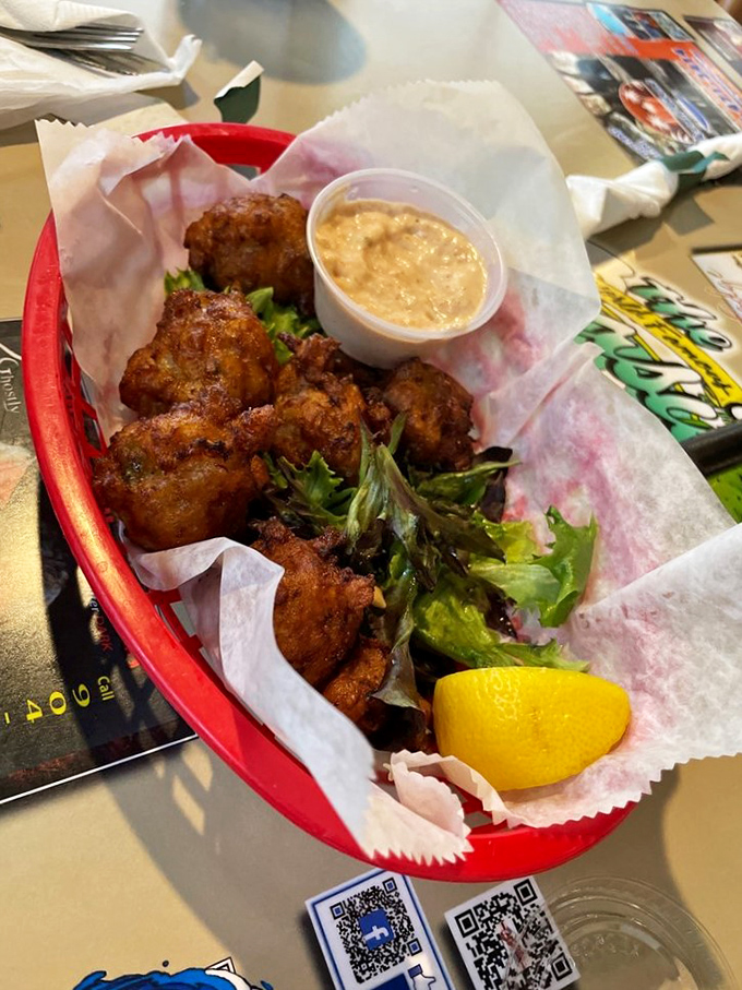 Conch fritters that could make a Bahamian homesick, served with a dipping sauce that deserves its own fan club and possibly a theme song.