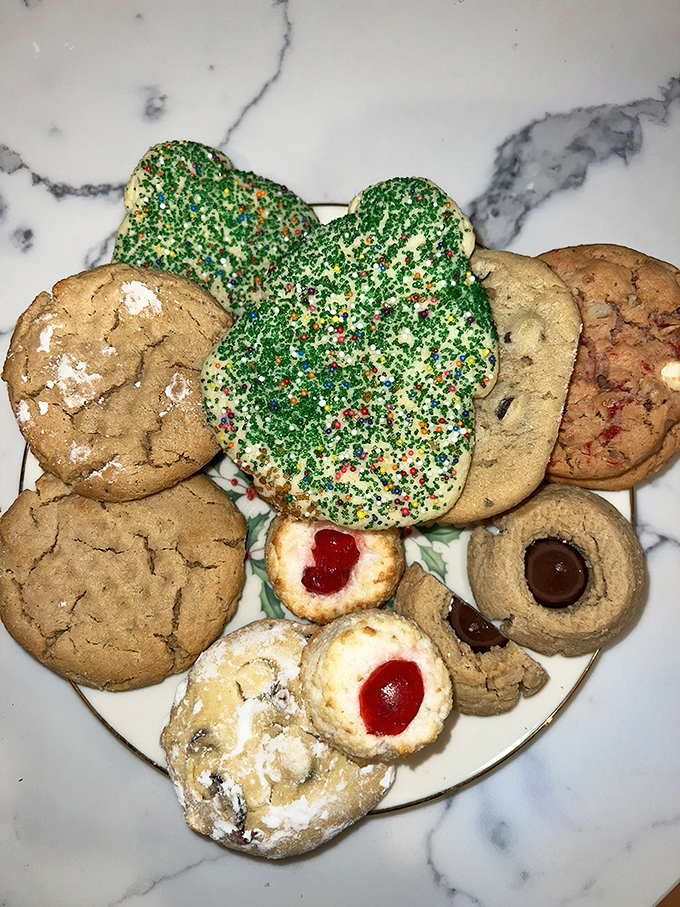 Cookie diversity at its finest! That shamrock cookie has more sprinkles than my childhood birthday parties had guests. Pure, unfiltered joy on a plate.