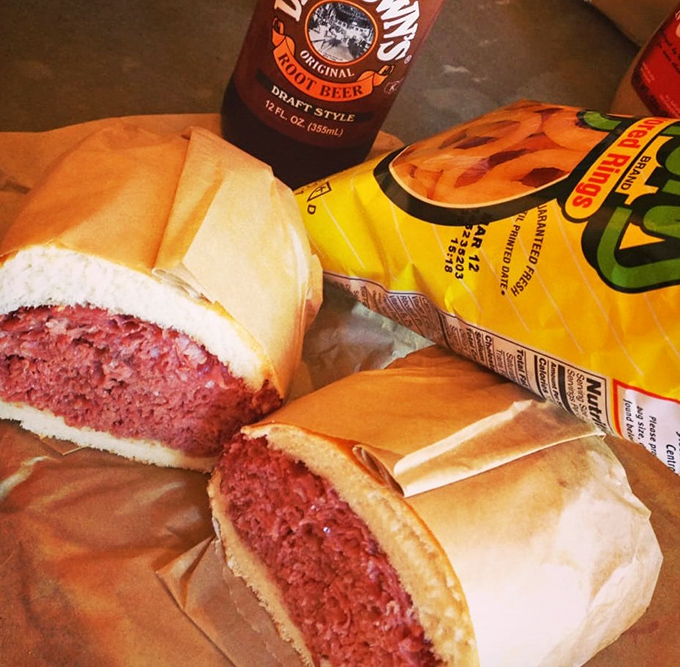 This isn't just corned beef – it's a ruby-red mountain range nestled between bread valleys. Pair with chips for the full experience.