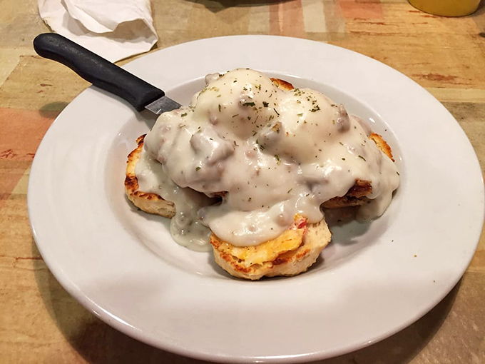 The Country Benedict: where biscuits meet gravy, eggs, and all your morning comfort food dreams. Diet plans surrender at first sight.