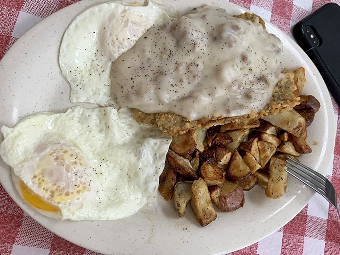 Country fried steak smothered in gravy with eggs sunny-side up &ndash; the breakfast trifecta that makes getting out of bed worthwhile.