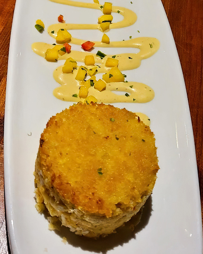 Golden-crusted perfection that transforms humble crab into something worthy of standing ovations and happy tears of joy.