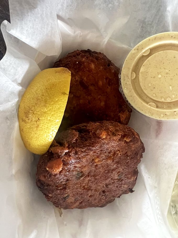 Crab cakes that are actually crab, not filler&mdash;a revolutionary concept that deserves its own holiday. That mustard sauce is liquid sunshine.