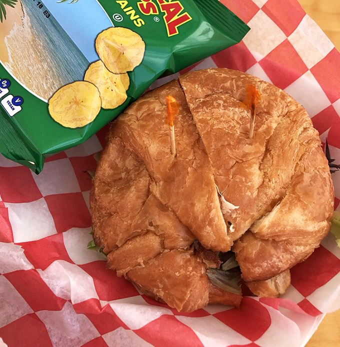 The croissant cradles this crab cake sandwich like it was destined for this purpose since leaving the oven. Flaky meets flaky in the best possible way.