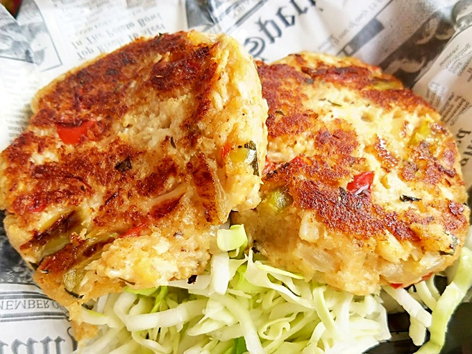 Crispy on the outside, succulent within—these crab cakes aren't just food, they're an edible postcard from the ocean.