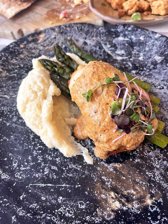 Fish transformed into art. This crab-stuffed flounder with asparagus and creamy pur&eacute;e proves that seafood can be both comfort food and culinary masterpiece.