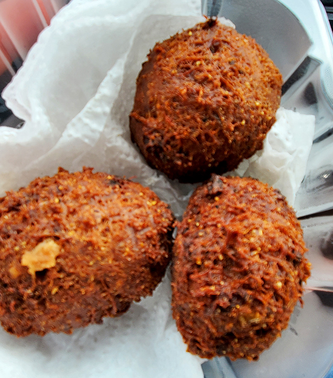 These golden-fried crab balls aren't just appetizers—they're edible treasure chests of coastal flavor that would make Neptune himself jealous.