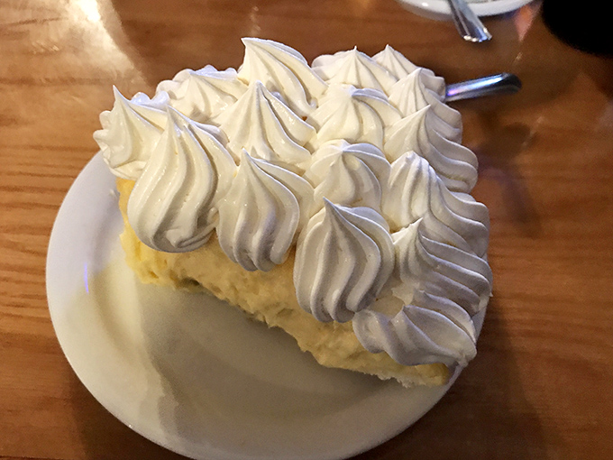 Cream pie that makes you contemplate driving across state lines just for dessert. Those perfect whipped cream peaks deserve their own Ohio landmark designation. 