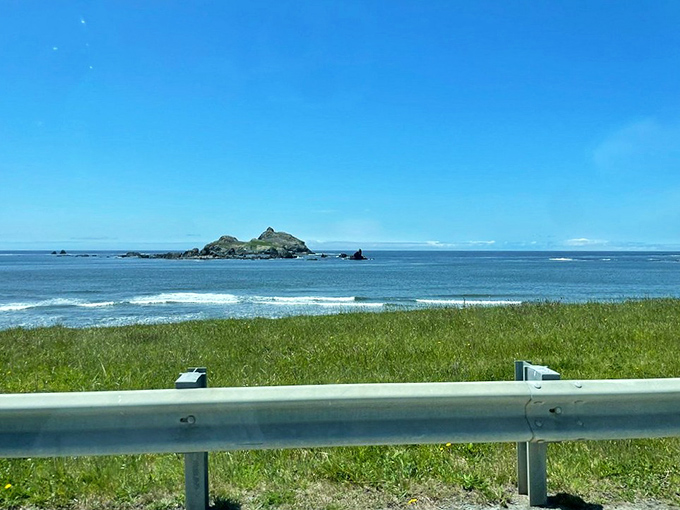 Offshore rocks punctuate the endless blue like nature's exclamation points, reminding you that the Pacific is never just a backdrop.