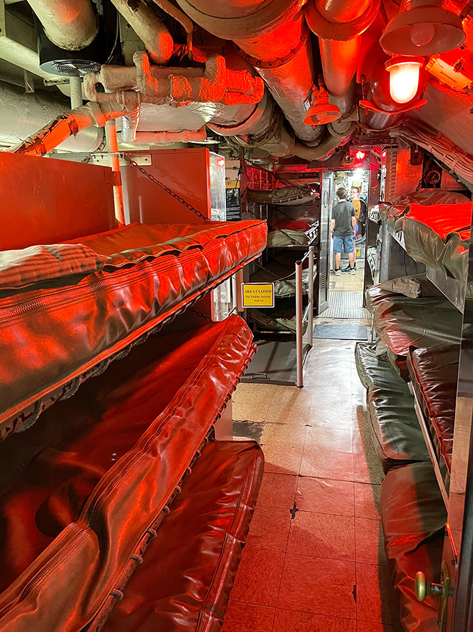 Stacked like human filing cabinets, sailors slept in these tight quarters. Personal space? That's something you remembered from shore leave.