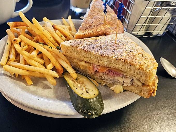A proper Cuban sandwich with crisp, golden fries and a house pickle&mdash;lunch perfection that makes you wonder why breakfast gets all the glory.