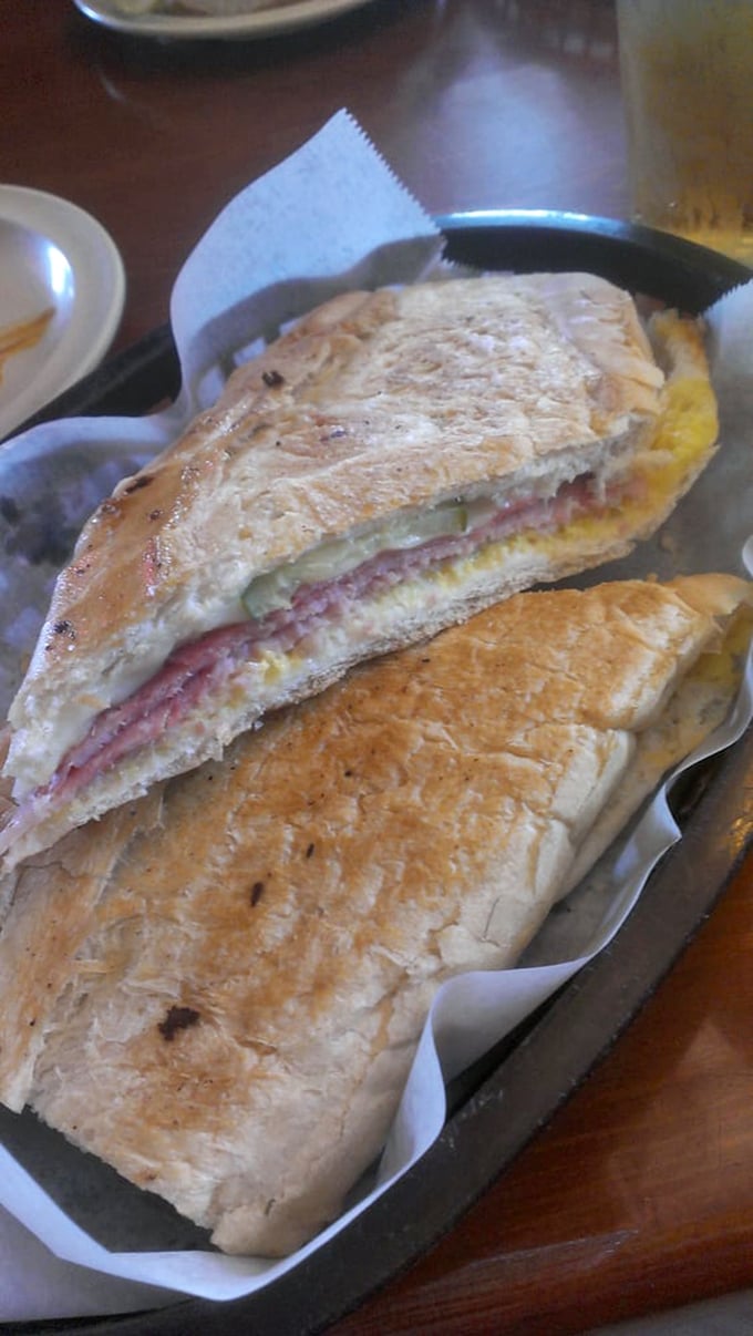 The Cuban sandwich&mdash;Florida's gift to the culinary world. Pressed to perfection with ham, cheese, and pickles creating a symphony of flavors.