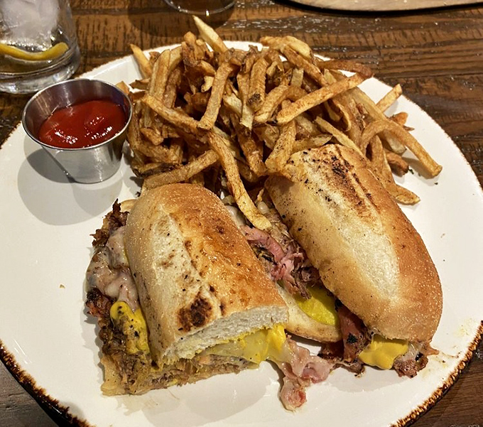 A proper Cubano with crispy fries &ndash; the kind of sandwich that makes you wonder why you ever settled for ordinary lunch options.