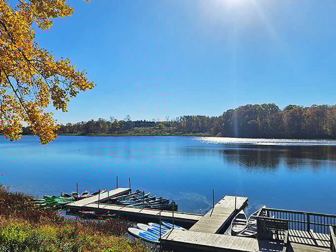 Autumn paints Punderson Lake with a palette that would make Bob Ross weep with joy. Boat docks await adventurers ready to paddle into serenity.