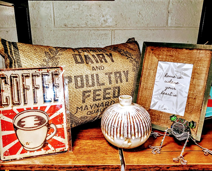 A vignette that screams "farmhouse chic" before HGTV made it a thing. That burlap coffee sack pillow has stories to tell.