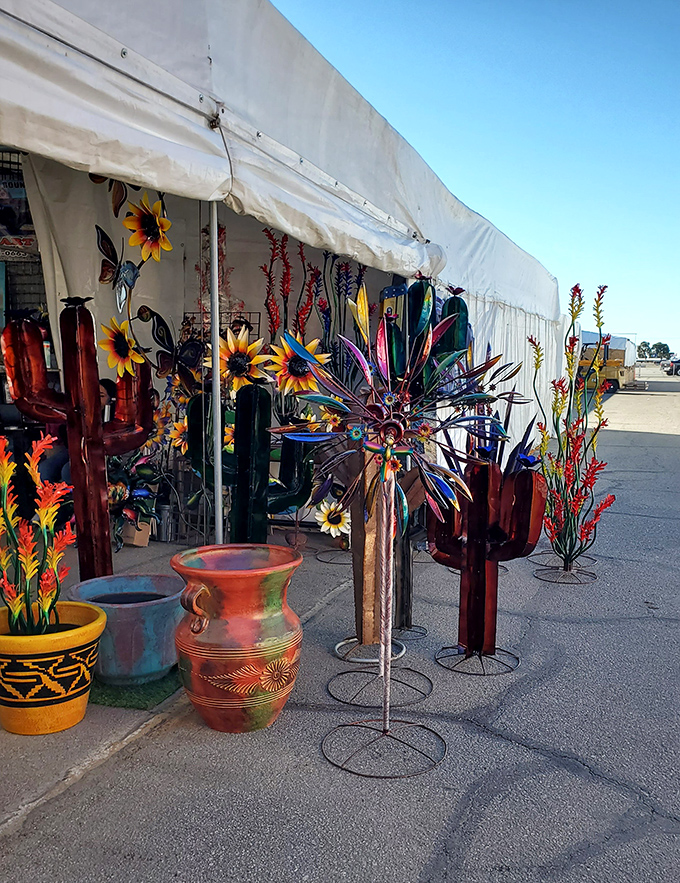 Metal cacti and colorful pottery bring desert charm home&mdash;garden art that thrives without watering in this vibrant vendor display.