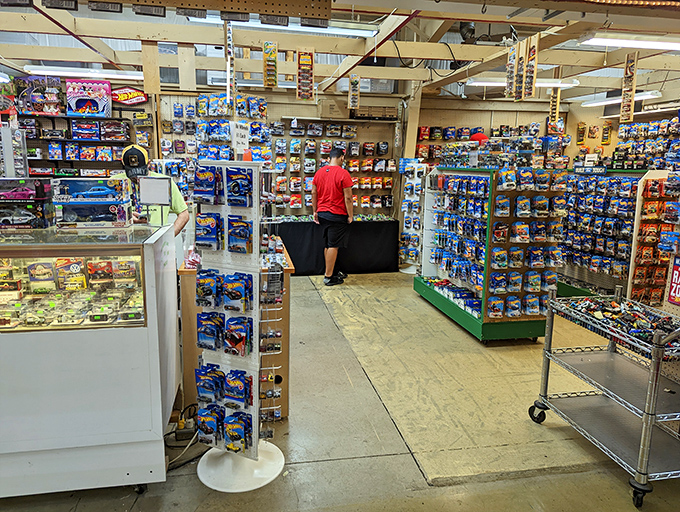 Die-cast dreams and collectible fantasies fill every inch of this booth. The toy cars may be small, but the nostalgia is supersized.