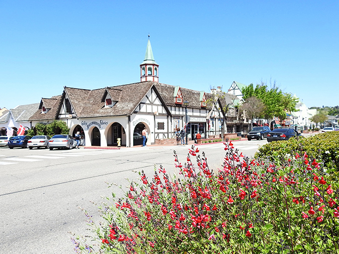 Spring blooms frame Solvang's distinctive architecture, creating a postcard-perfect scene that's almost too charming to be real.