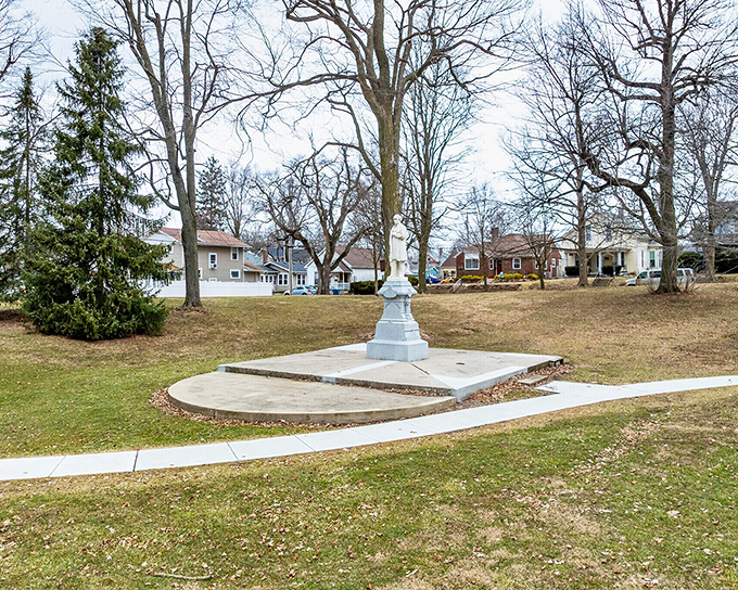 A peaceful park monument stands as a quiet counterpoint to downtown's bustle. Sometimes the best attractions whisper rather than shout.