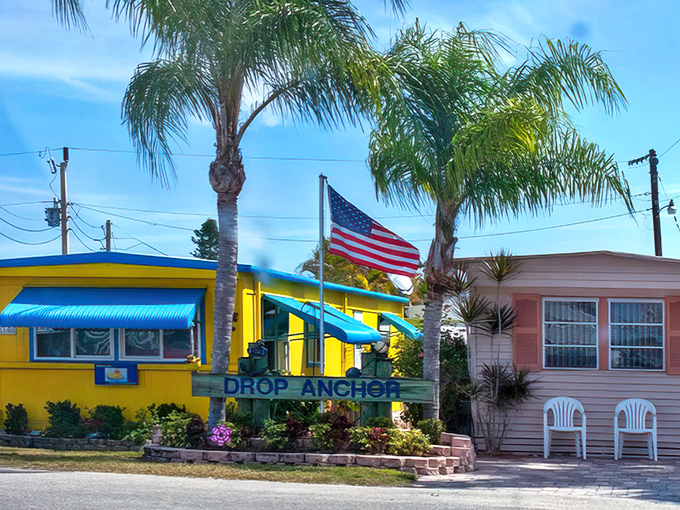 Drop Anchor and stay awhile&mdash;this sunny yellow cottage with its American flag seems to whisper, "Slow down, you're on island time now."