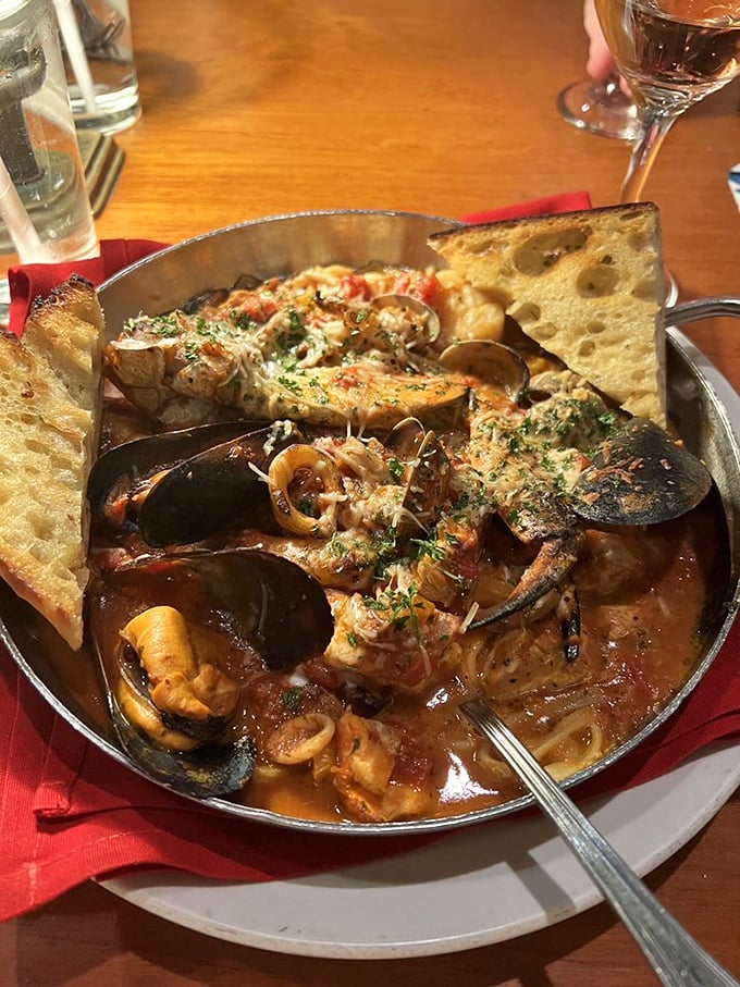 The cioppino &ndash; a seafood United Nations where every delegate is swimming in tomato-wine broth diplomacy. Bring extra bread for crucial negotiations.