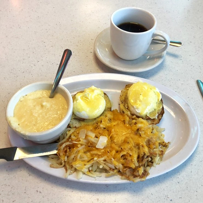 Breakfast architecture at its finest&mdash;perfectly poached eggs atop a foundation of hash browns, where every forkful delivers that satisfying morning harmony.