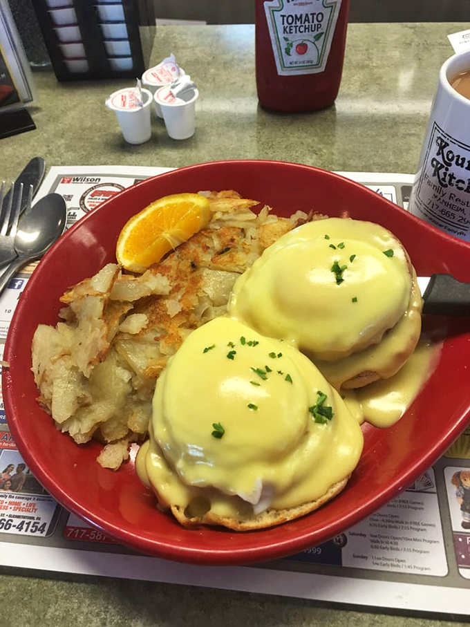 Eggs Benedict that belongs in the Breakfast Hall of Fame. That hollandaise sauce isn't just yellow—it's liquid sunshine on a perfectly toasted English muffin.