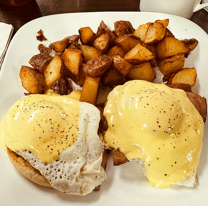 Eggs Benedict done right&mdash;perfectly poached eggs, velvety hollandaise, and home fries that deserve their own fan club.