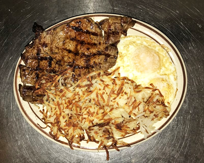 Steak and eggs: the breakfast of champions, cowboys, and anyone who understands that mornings deserve proper celebration. Those hash browns are crispy perfection.