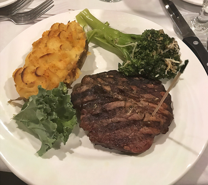 The filet mignon arrives like royalty, perfectly charred outside, tender within, making you wonder why you ever wasted time on lesser cuts.