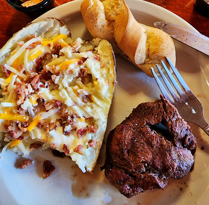 Filet mignon with a loaded baked potato: proof that sometimes the simple pleasures in life require nothing more than a sharp knife and healthy appetite.