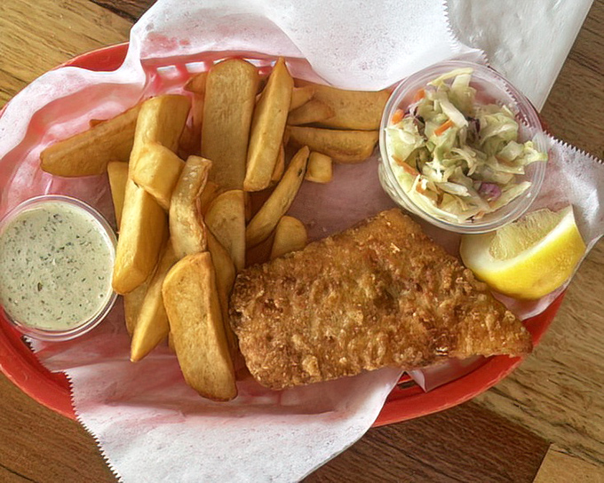Classic fish and chips with a side of coleslaw&mdash;simple perfection that would make a British pub-goer weep with joy.