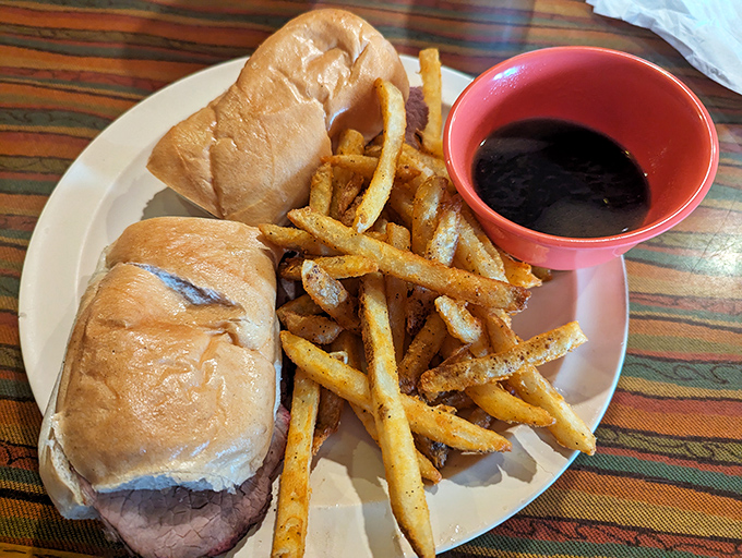 The French Dip &ndash; where thinly sliced beef meets crusty bread in a romance that's only improved by that little cup of au jus for dunking.