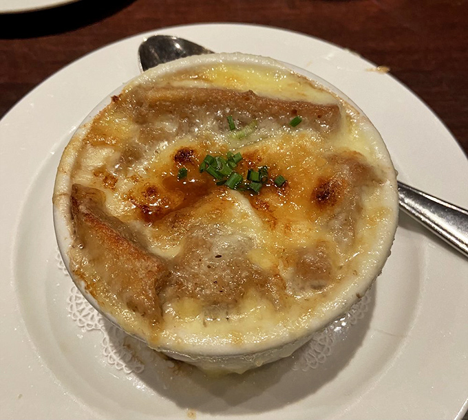 French onion soup that's worth the stringy cheese moment. This bubbling cauldron of savory goodness makes you forget you're in Ohio, not a Parisian bistro.
