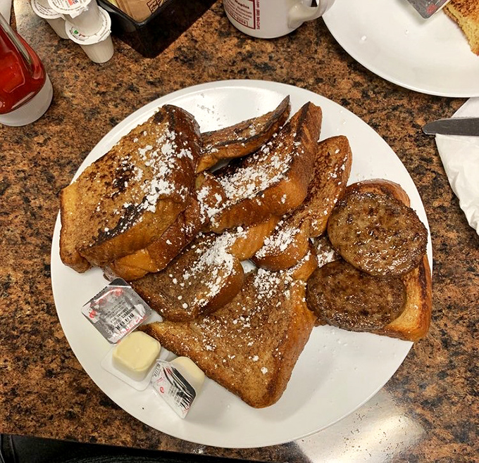 French toast that's achieved the golden-brown perfection we all attempt at home but secretly know requires diner magic to truly master.