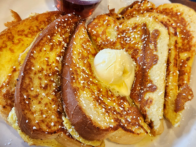 French toast that's achieved celebrity status in my personal breakfast hall of fame&mdash;golden, cinnamon-kissed, and worthy of its powdered sugar snowfall.