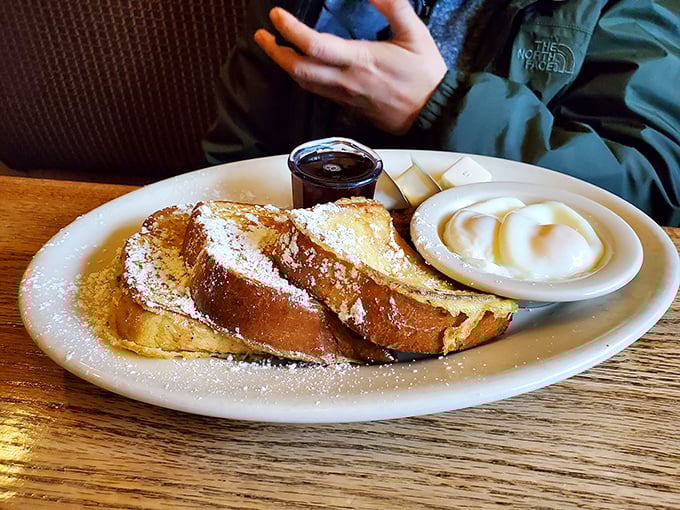 French toast that puts France to shame, dusted with powdered sugar like the first snow of winter on the Sierras.