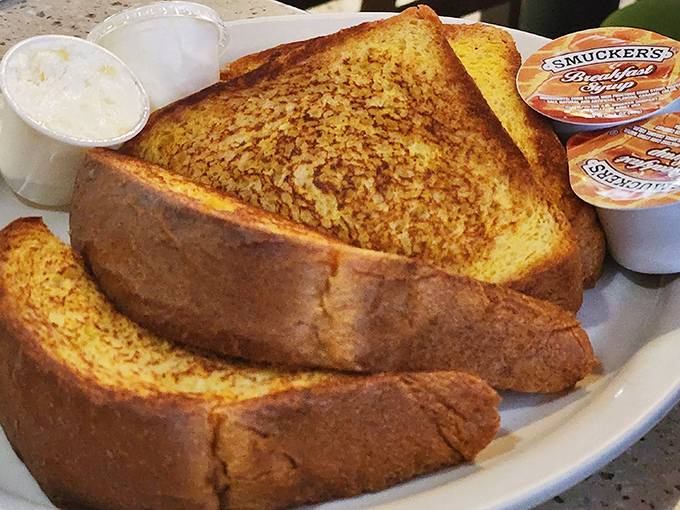 Toast so perfectly golden-brown it belongs in the breakfast hall of fame. Butter melted all the way to the edges&mdash;as it should be.