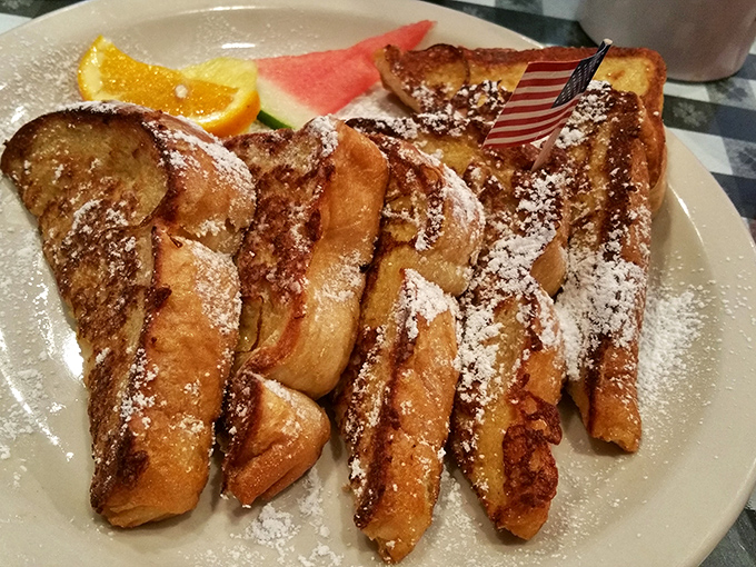French toast that's dressed for success&mdash;powdered sugar dusted like fresh snow, with fruit sidekicks waiting in the wings.