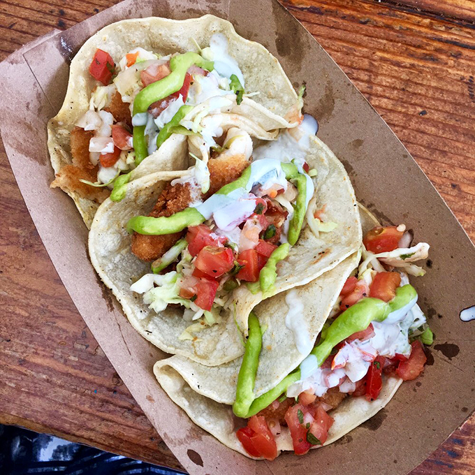These fish tacos don't just speak&mdash;they sing with fresh ingredients. Crispy fish, crunchy cabbage, and creamy sauce create a harmony that would make The Beach Boys jealous.