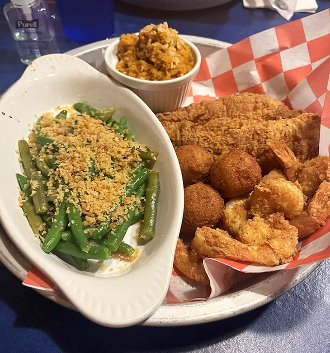 The ultimate seafood platter: crispy fried goodness paired with green beans that somehow make you feel virtuous. Diet starts tomorrow!