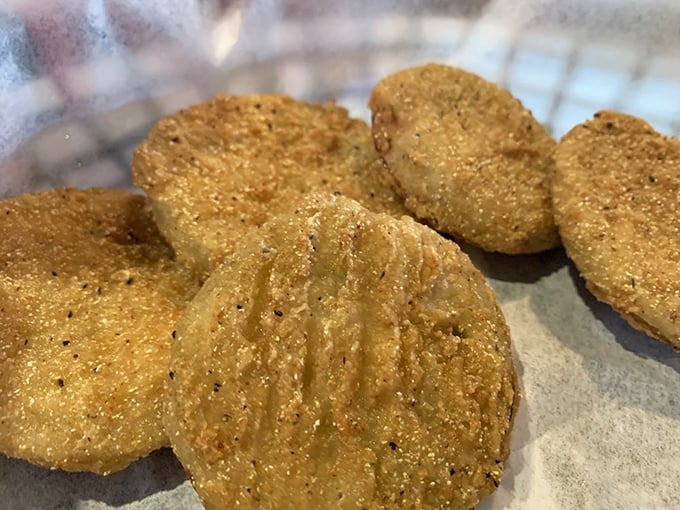 Fried green tomatoes that would make even the most sophisticated palate surrender to their crispy, tangy perfection completely.