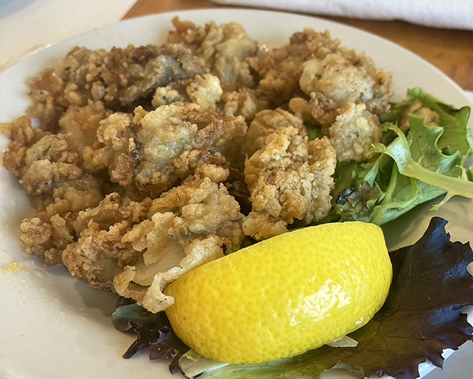 Golden fried oysters so perfectly crispy, they practically sing coastal hymns with every satisfying, briny bite.