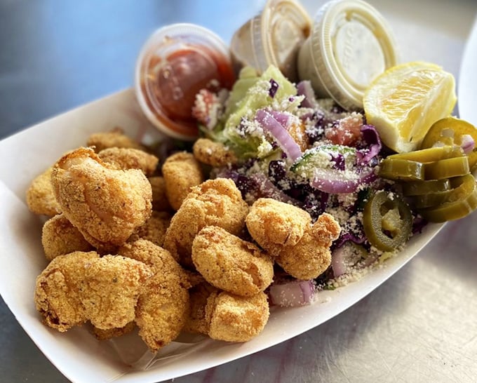 Golden nuggets of the sea! These fried scallops with jalapeños and red onion are what seafood dreams are made of.