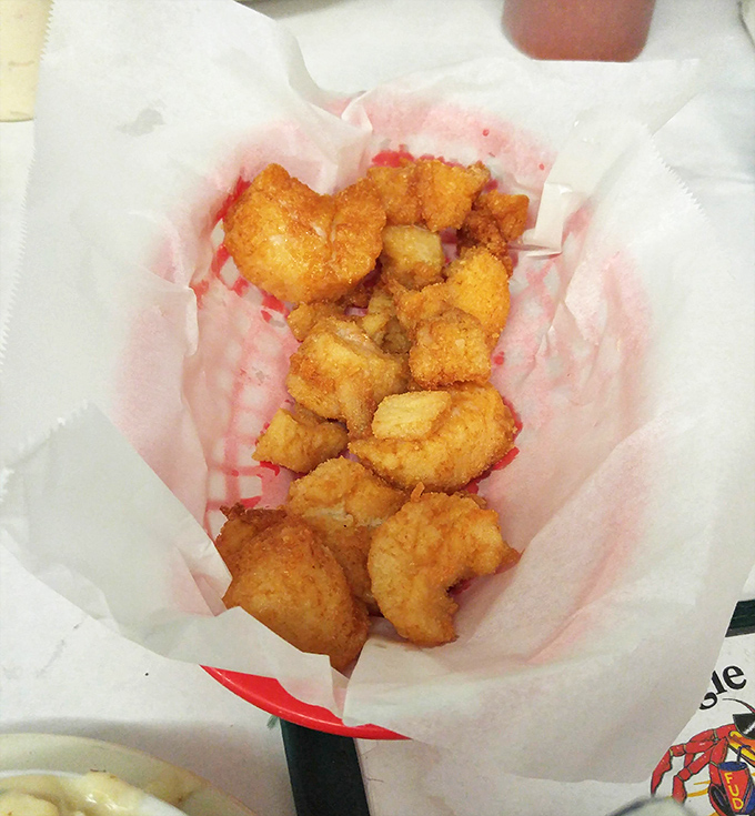 Golden-fried treasures from the deep. These crispy morsels make you wonder why anyone would eat anything else from the sea.
