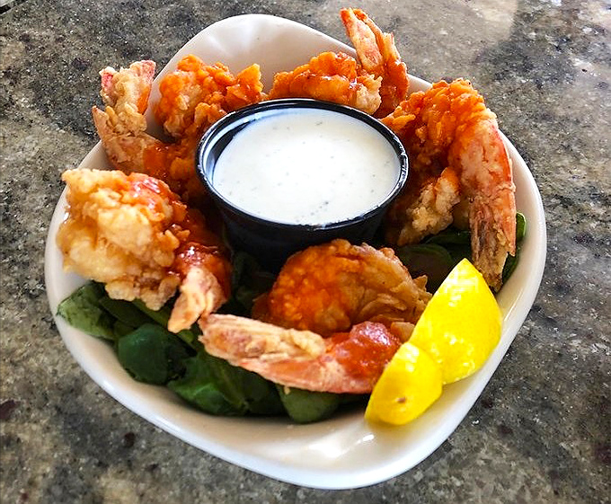 Fried shrimp arranged in a perfect circle, like a delicious clock counting down the seconds until you devour them all