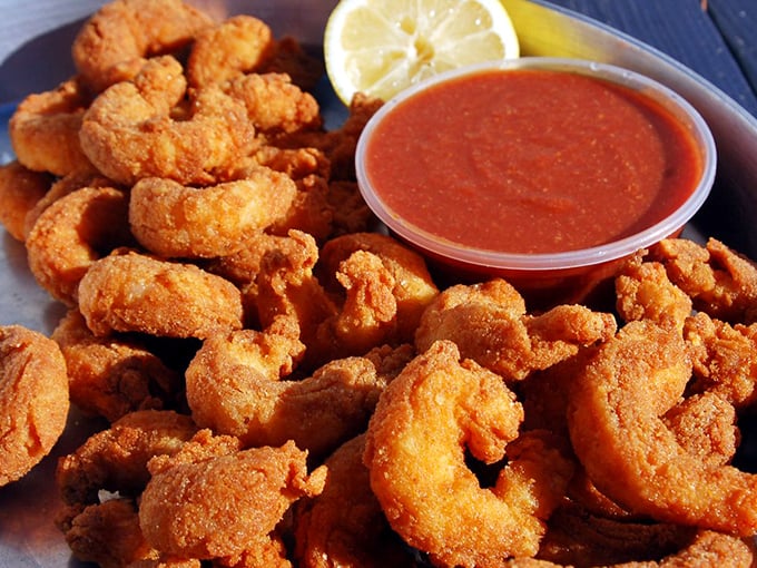 Golden fried shrimp that crunch like they're auditioning for a food commercial, paired with tangy cocktail sauce. The Midwest's delicious rebuttal to coastal snobbery.