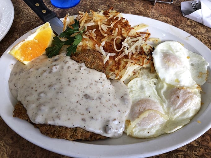 Country fried steak smothered in gravy with eggs on the side&mdash;comfort food that hugs your insides like a warm flannel shirt.
